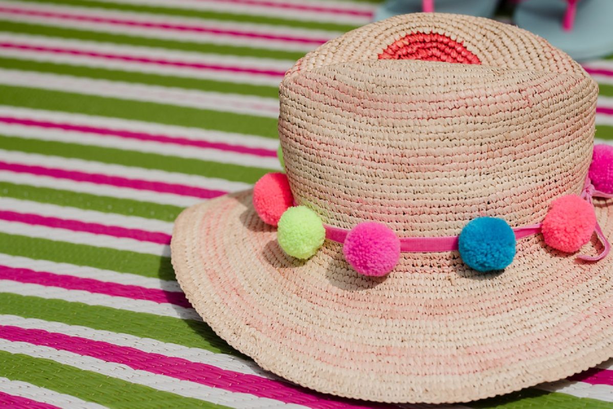 Pom pom clips, a set of 4 small pom poms in various colours